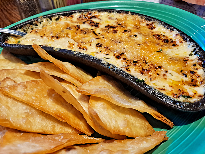 Bubbling crab dip that's essentially molten gold for seafood lovers. Those crispy tortilla chips are merely delivery vehicles for this creamy treasure.