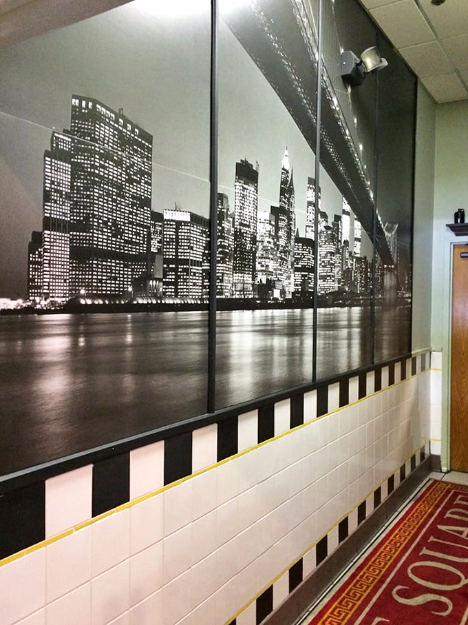 The New York skyline mural transforms a simple hallway into a metropolitan escape. Suddenly, your pancakes feel more cosmopolitan.