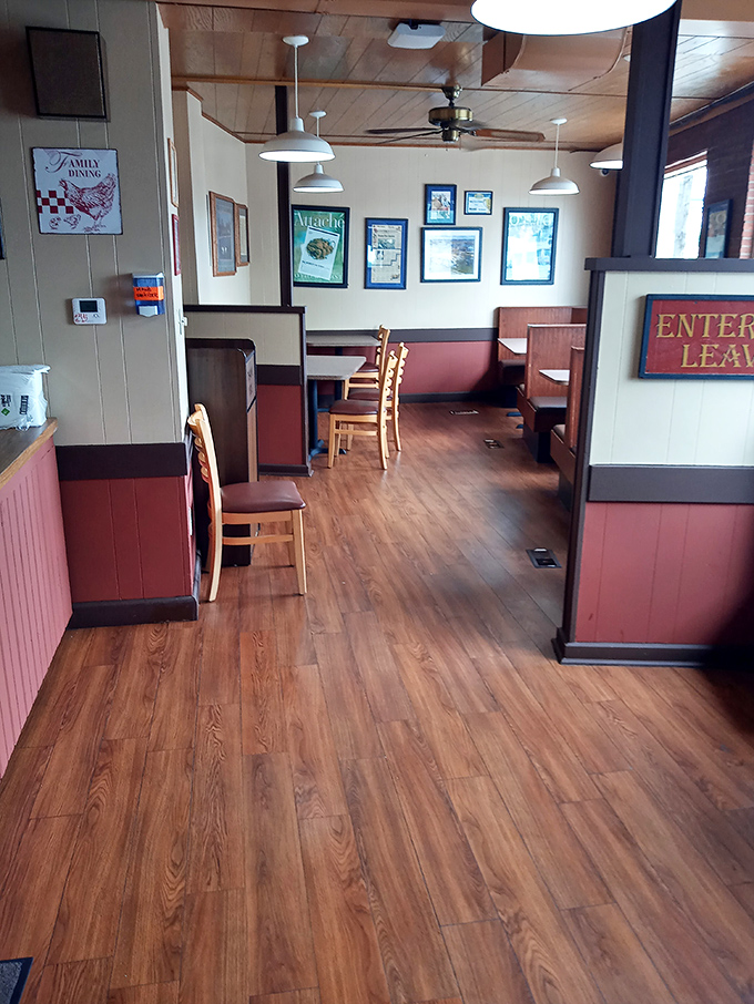 Clean lines, wooden booths, and simple decor&mdash;because nothing should distract from the main event. This dining room knows its priorities.