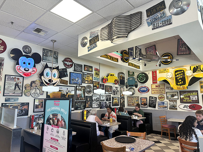 Wall-to-wall memorabilia creates a museum of Americana where you can eat the exhibits. Even Mickey looks hungry for a burger.