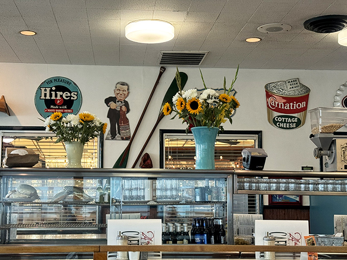 Classic Americana decorates every corner, from Hires Root Beer signs to fresh sunflowers brightening the day.