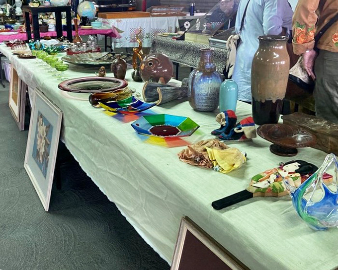 A tabletop museum of yesterday's treasures—from rainbow glass dishes to earthy pottery. Someone's former mantelpiece stars are ready for their comeback tour.