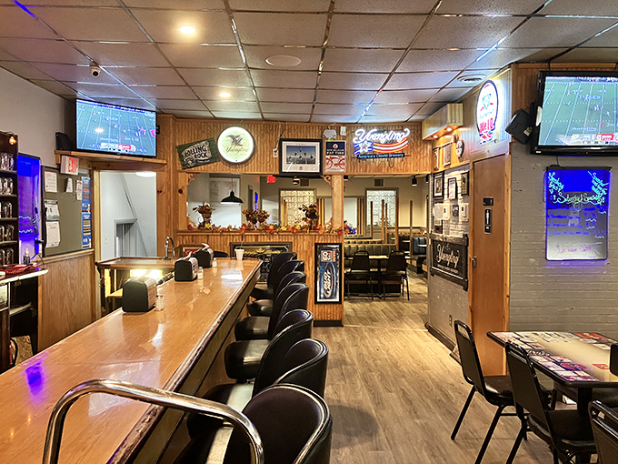 Sports on TV, neon signs glowing, and conversations flowing&mdash;this is where community happens, one meal at a time.