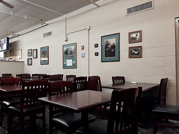 Simple framed photos line the walls, telling stories of Athens history while you create your own memories, one chicken piece at a time.