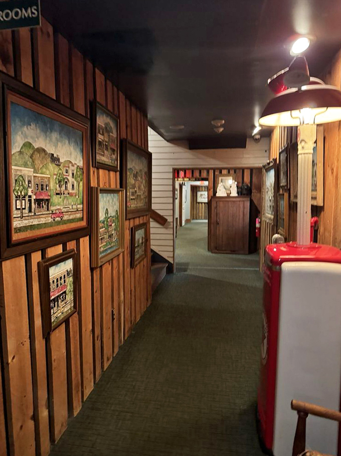 The hallway gallery feels like walking through Virginia's past, with wooden panels and local art creating a museum-meets-home vibe.