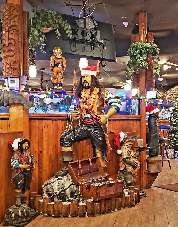 Pirate statues wearing Santa hats prove that even seafaring rogues celebrate the holidays. This decor is so delightfully over-the-top, it circles back to perfect.