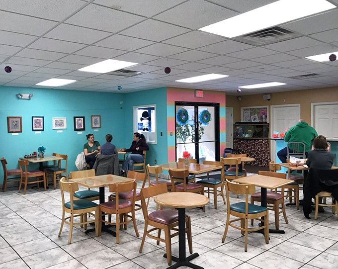 The dining area where strangers become friends, united by the universal language of "mmmmm" and "you've got to try this one."