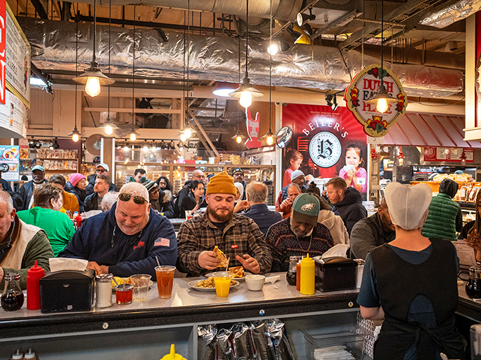 The market buzzes with hungry patrons&mdash;a cross-section of Philadelphia life gathering for what might be the city's most democratic dining experience.