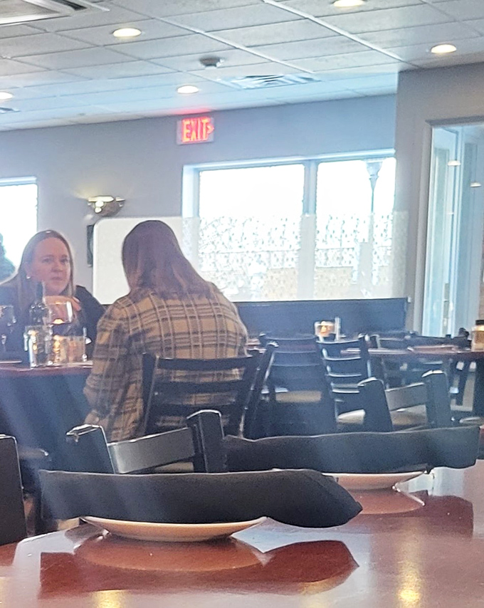 Fellow diners enjoying their meals proves this place attracts folks who appreciate truly exceptional food experiences.