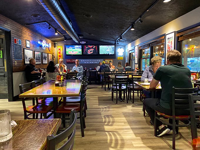 Where locals gather to share stories and appetizers with equal enthusiasm. Those TVs aren't the main attraction&mdash;the conversations are.