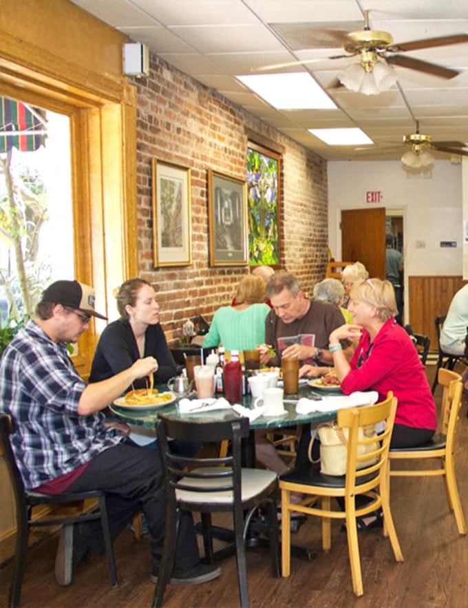 A snapshot of Savannah life &ndash; locals and visitors sharing tables, stories, and the universal language of "please pass the syrup."