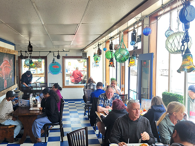 The dining room buzzes with the universal language of seafood satisfaction &ndash; that particular silence that falls when everyone is too busy enjoying their food to speak.