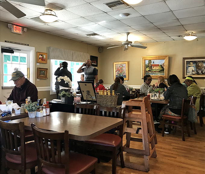 A dining room filled with happy patrons&mdash;the universal expression of "I made the right decision coming here" visible on every face.