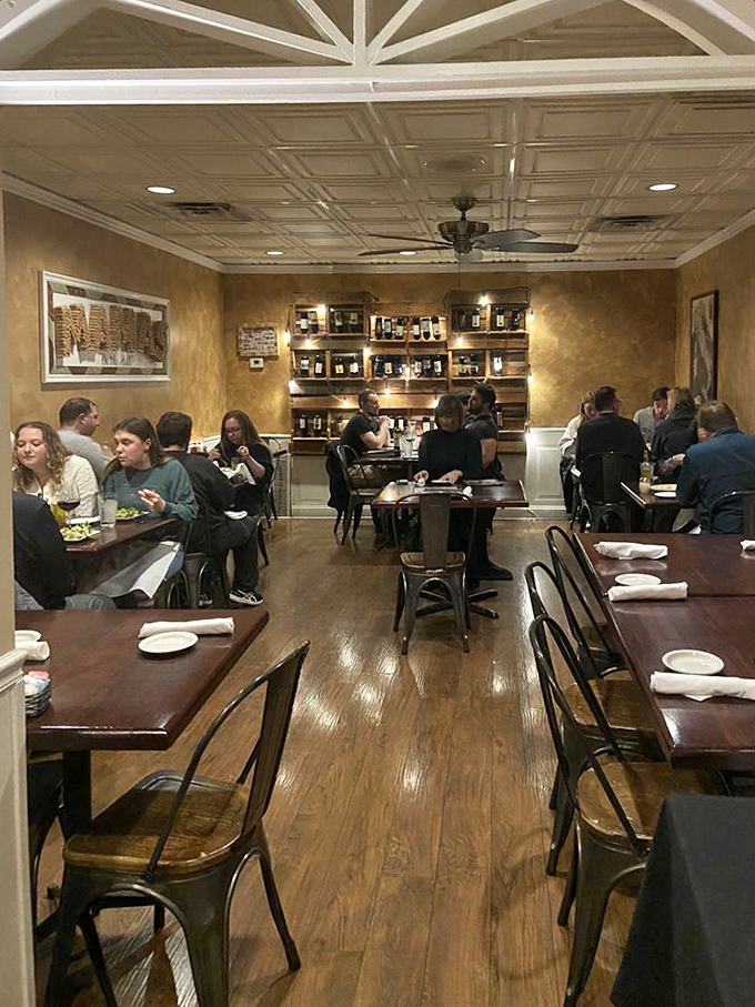 Diners lost in conversation and communion with their pasta&mdash;the universal language of Italian food bringing people together.