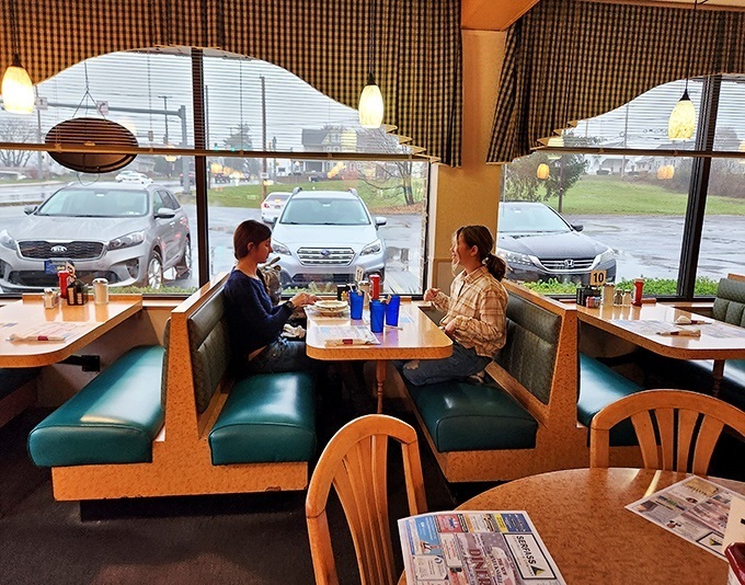 Classic diner booths&mdash;where conversations flow as freely as the coffee. These vinyl-covered time machines have witnessed countless life moments.