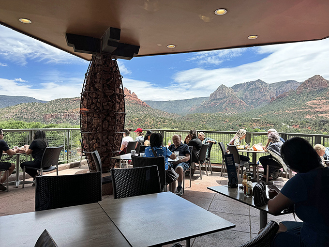 Fellow diners enjoying the perfect combination of Sedona's natural splendor and Wildflower's culinary artistry. Some views deserve to be savored alongside good food.