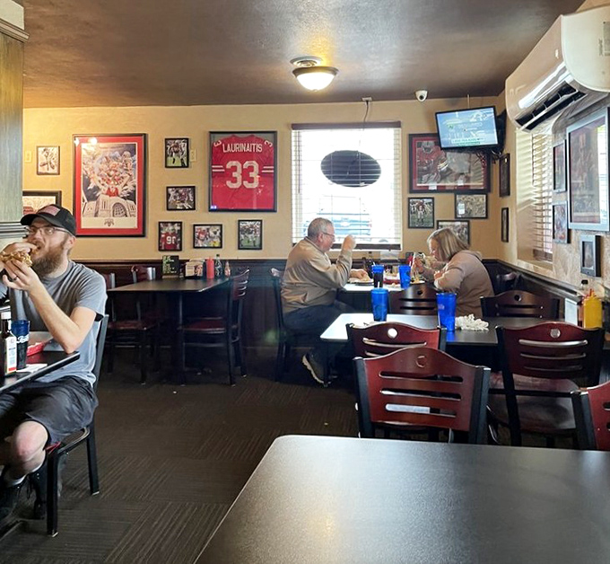 The dining room hums with the beautiful symphony of people enjoying honest food without pretense or performance.