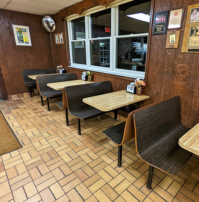 Old-school booths where countless conversations, celebrations, and sugar rushes have unfolded over decades of donut diplomacy.