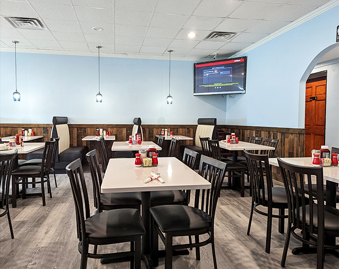 The dining area balances modern comfort with classic diner charm&mdash;the Switzerland of restaurant atmospheres where everyone feels welcome.