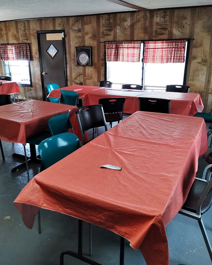 Coral tablecloths and teal chairs&mdash;a design choice that says, "We're focusing on what's on the plate, not under it."