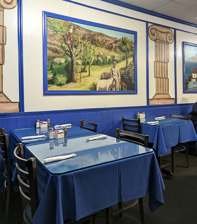 Blue tablecloths under glass tops reflect the Mediterranean aesthetic, while paintings of Greek landscapes transport you thousands of miles from Ohio.