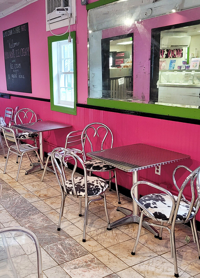 Pink walls, cow-print chairs&mdash;this seating area isn't just retro-chic, it's the perfect backdrop for ice cream euphoria.