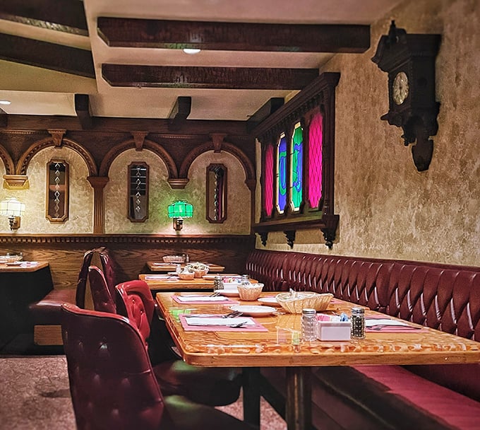 Rich burgundy booths invite you to slide in and stay awhile under the glow of stained glass that's witnessed decades of special occasions.