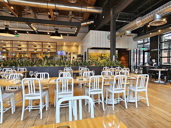White metal chairs and wooden tables create an atmosphere that's both minimalist and inviting. This is healthy eating without the health-food-store vibe.