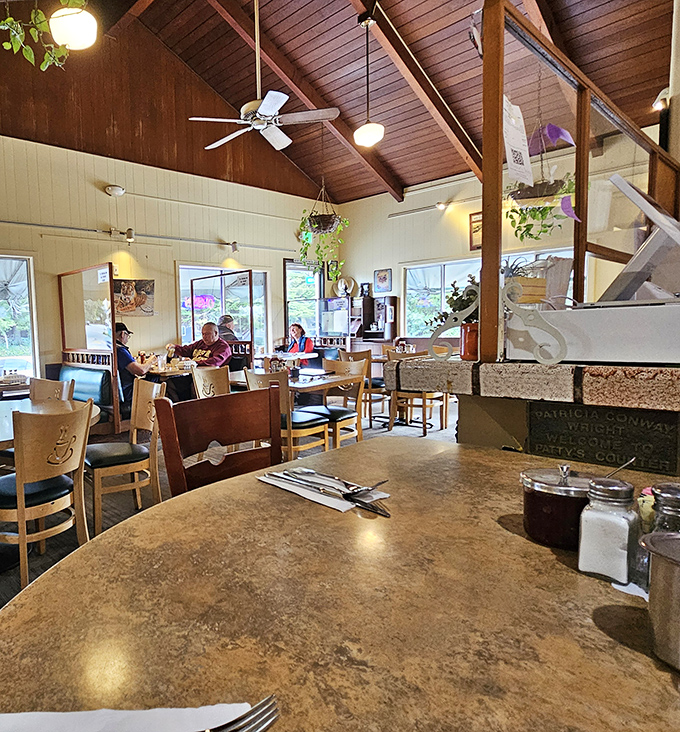 High wooden ceilings and cozy tables create that perfect "stay awhile" atmosphere where breakfast easily stretches into brunch territory.