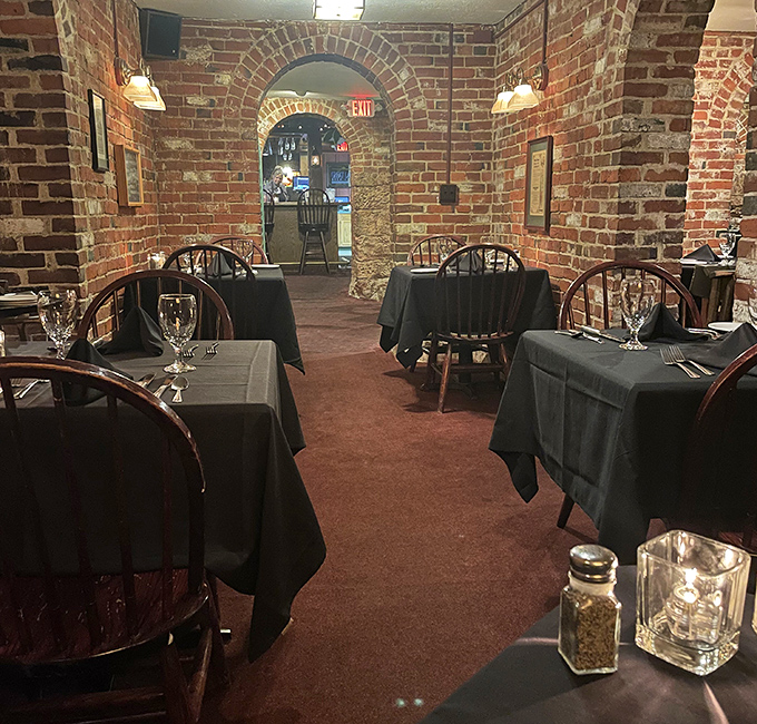 The brick archway dining room feels like you've discovered a secret wine cellar where steaks, not vintages, are the main attraction.