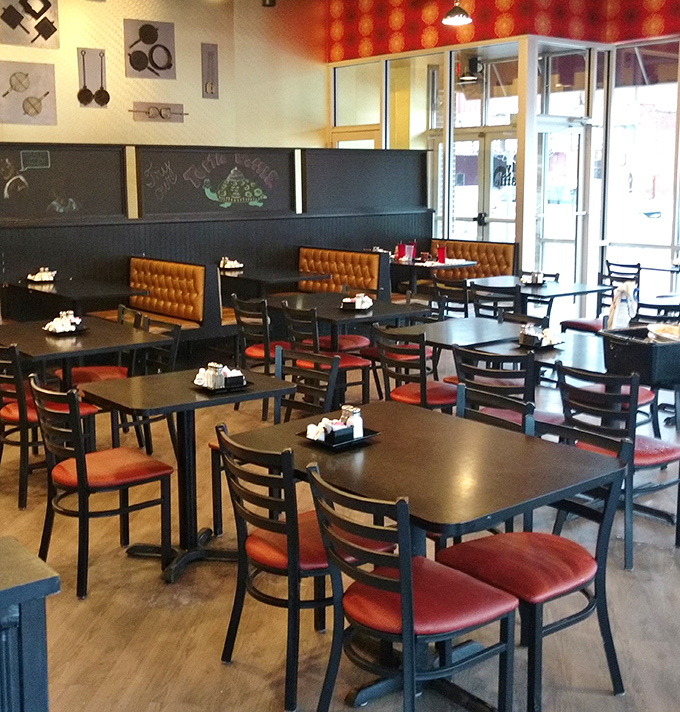 Cozy booths and tables await morning pilgrims seeking salvation in the form of perfectly cooked breakfast classics.