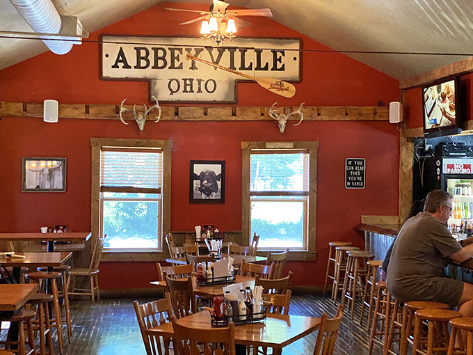 Abbeyville, Ohio represents on the wall while antlers stand guard. This dining room has hosted countless "Oh my God, you have to try this" moments.