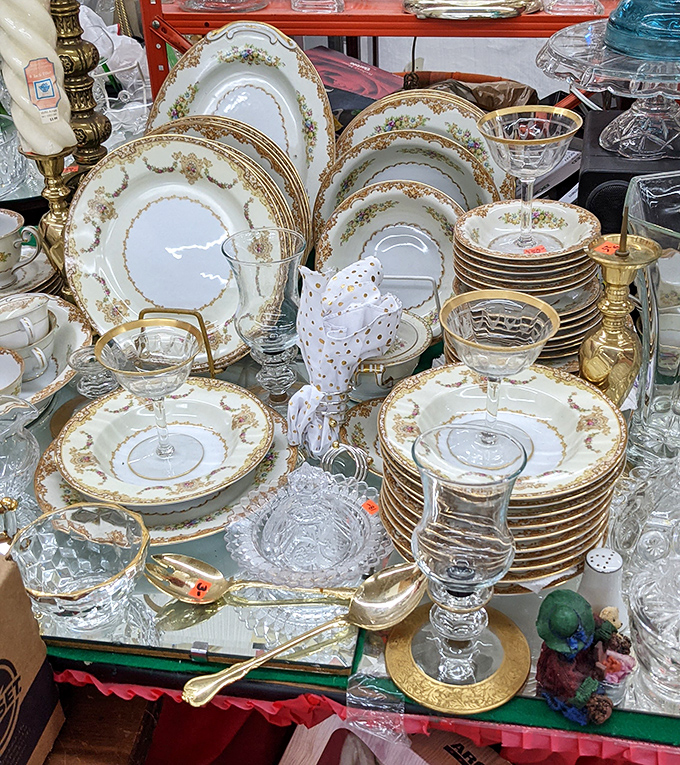 Elegant dishware waiting for its second act. Someone's formal dining room is about to get a glamorous upgrade at bargain basement prices.