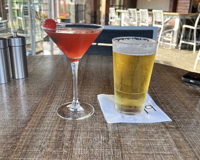 Cocktail hour done right: a ruby-red martini alongside golden beer. The adult version of choosing your own adventure, with much tastier outcomes.