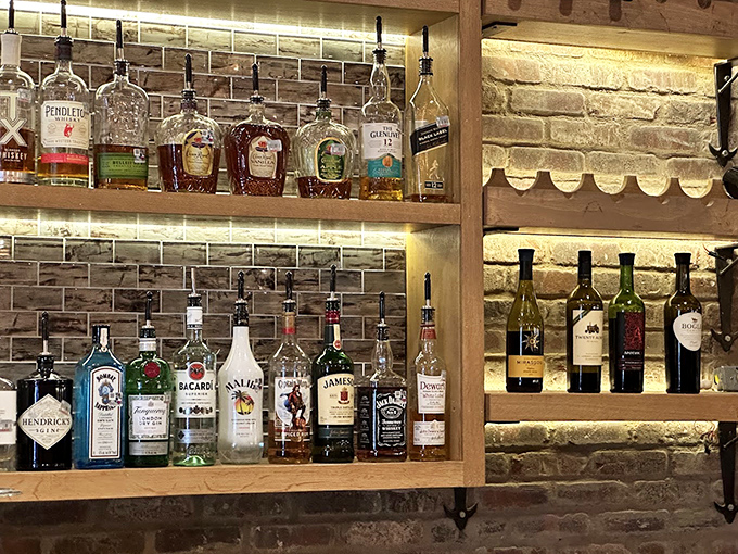 Behind the scenes, the open kitchen reveals the careful choreography of creating culinary magic daily.