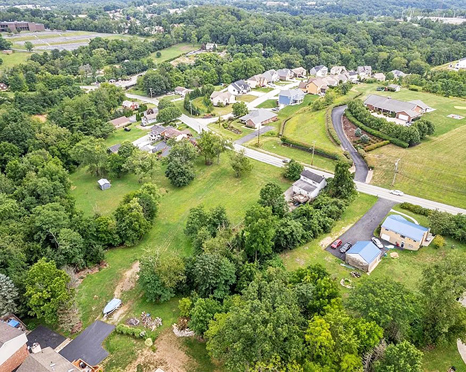 Another drone perspective shows how Saltsburg's neighborhoods blend seamlessly with the surrounding countryside&mdash;no harsh urban boundaries here.