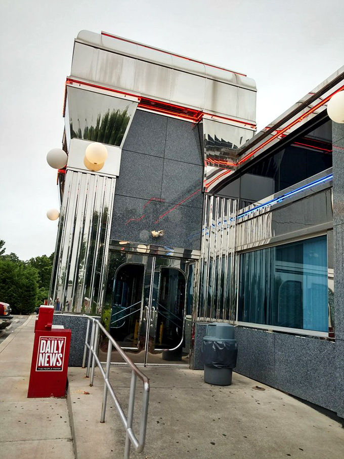 The entrance beckons with classic diner charm that promises authentic comfort food experiences inside waiting.