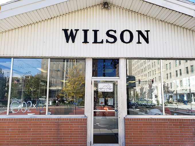 The entrance to Wilson's isn't just a doorway&mdash;it's a portal to a simpler time when food was honest and calories didn't count. 