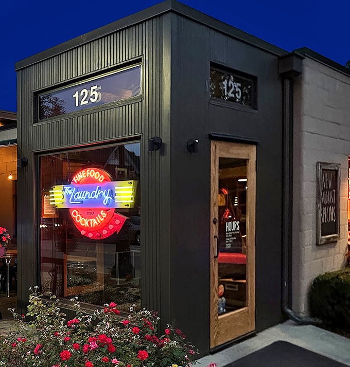 The neon sign glows like a beacon for hungry travelers. "Fine Food & Cocktails" isn't just a promise&mdash;it's a guarantee.