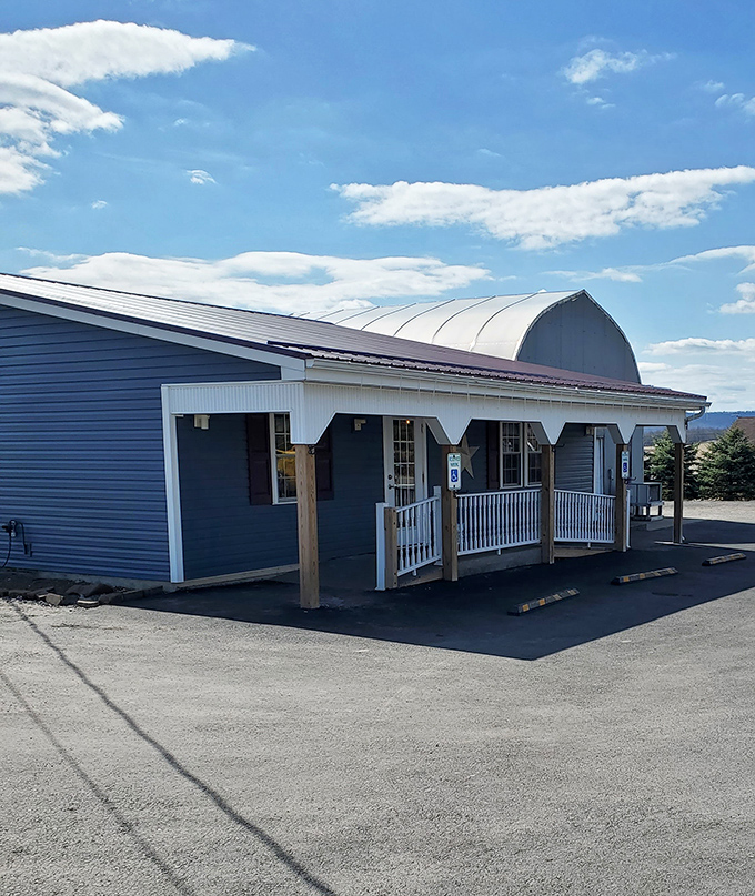 Blue skies frame the diner's distinctive curved roof&mdash;architectural proof that sometimes the best things in life aren't square.