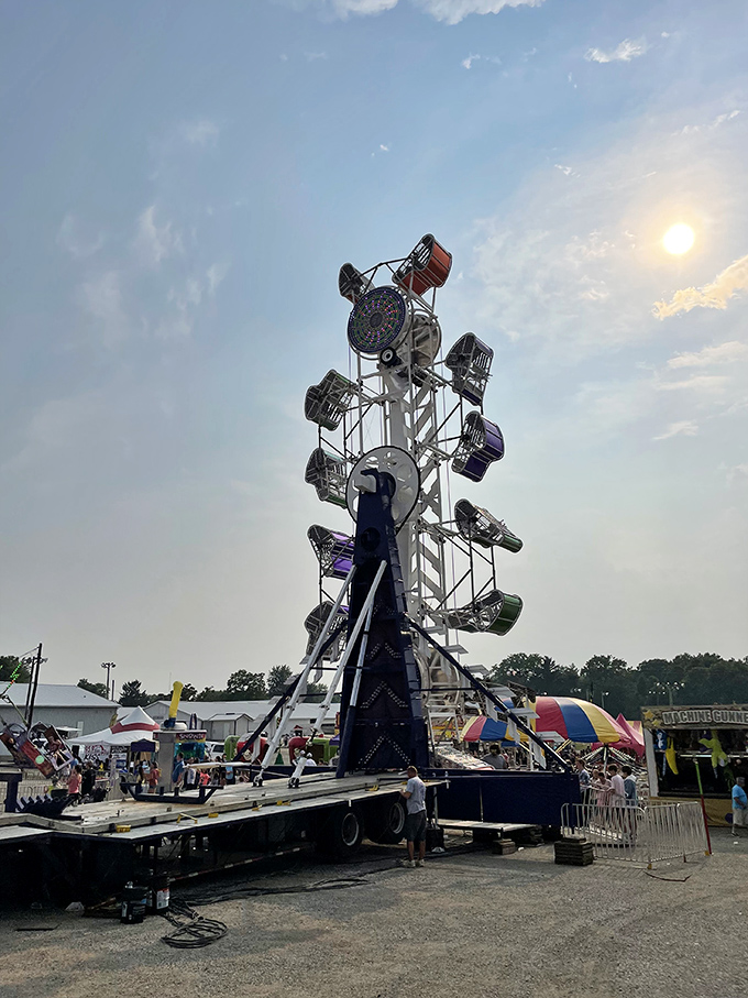 The county fair brings timeless amusements that delight both young and old, where ferris wheels turn against Indiana skies.