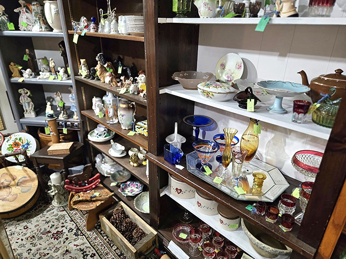 Shelves brimming with figurines and glassware that survived decades without a chip. That's craftsmanship you can't find at big box stores!