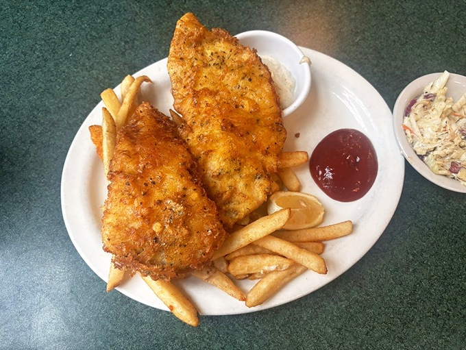 Fish and chips with a golden crust that crackles like vinyl records. The kind of fried goodness that makes nutritionists look the other way.