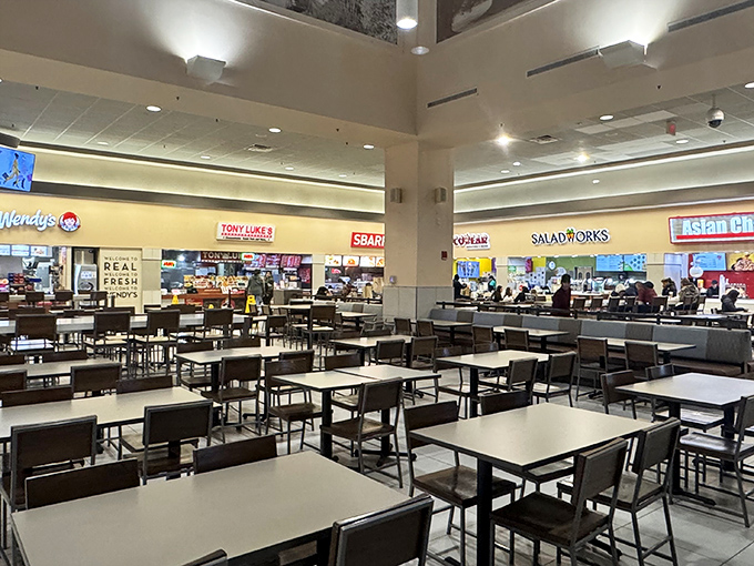 The food court offers a moment of respite for weary shoppers. Those empty tables won't stay that way long once the lunch rush hits. 
