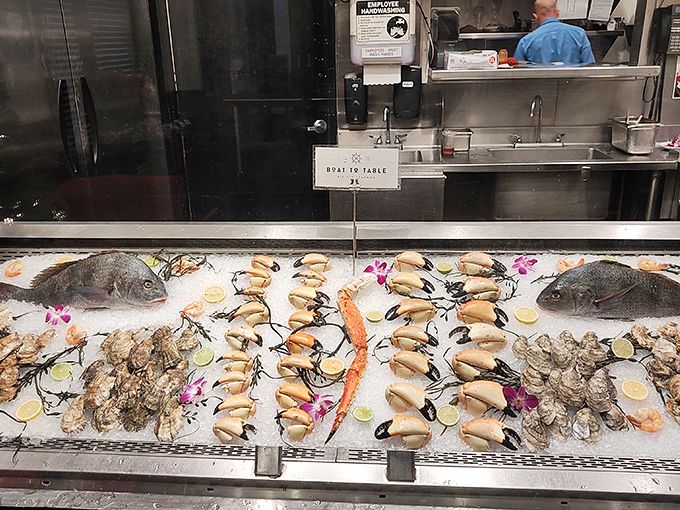 The seafood display case &ndash; where tomorrow's dinner meets today's dreams in a bed of ice adorned with edible flowers. 