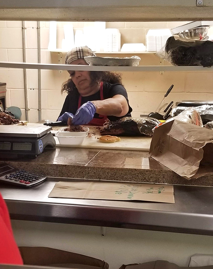 Behind the scenes where the magic happens. Skilled hands transforming simple ingredients into memorable meals, one order at a time.