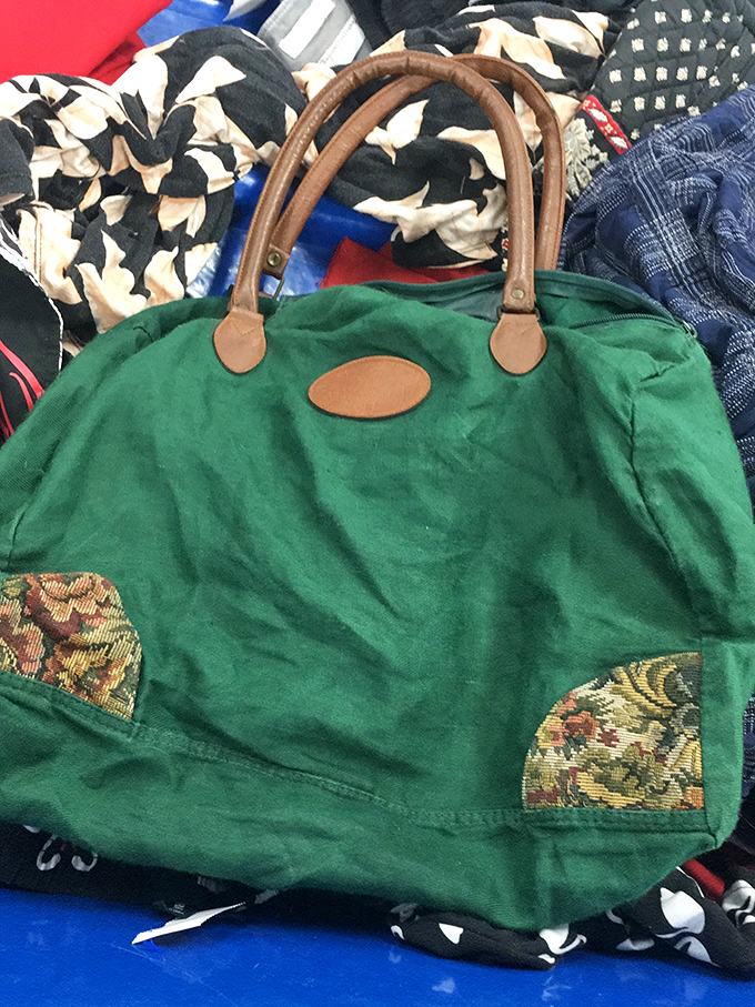 The weekender bag that screams "I summer in Vermont" but whispers "I cost less than avocado toast." Those leather handles have character that money usually can't buy.