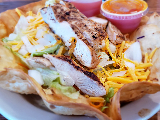 Fresh grilled chicken taco salad served in a crispy shell&mdash;because salads should never be boring punishment food.
