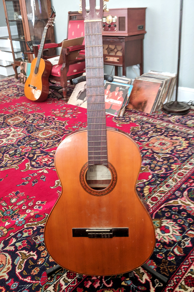 Classical guitars waiting patiently to serenade another generation with melodies that never go out of style.