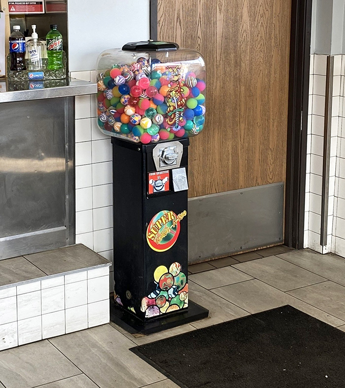 The vintage gumball machine stands sentinel by the door&mdash;a colorful reminder that sometimes life's simplest pleasures are the most satisfying.